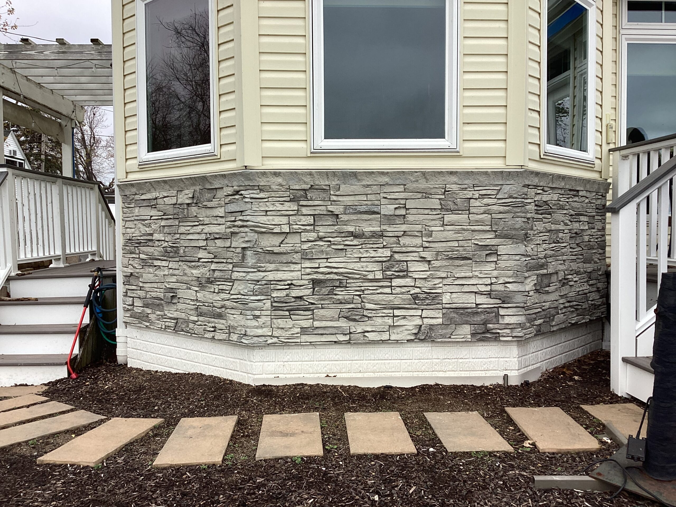 Dianne's Exterior Grey Stone Veneer Siding - GenStone